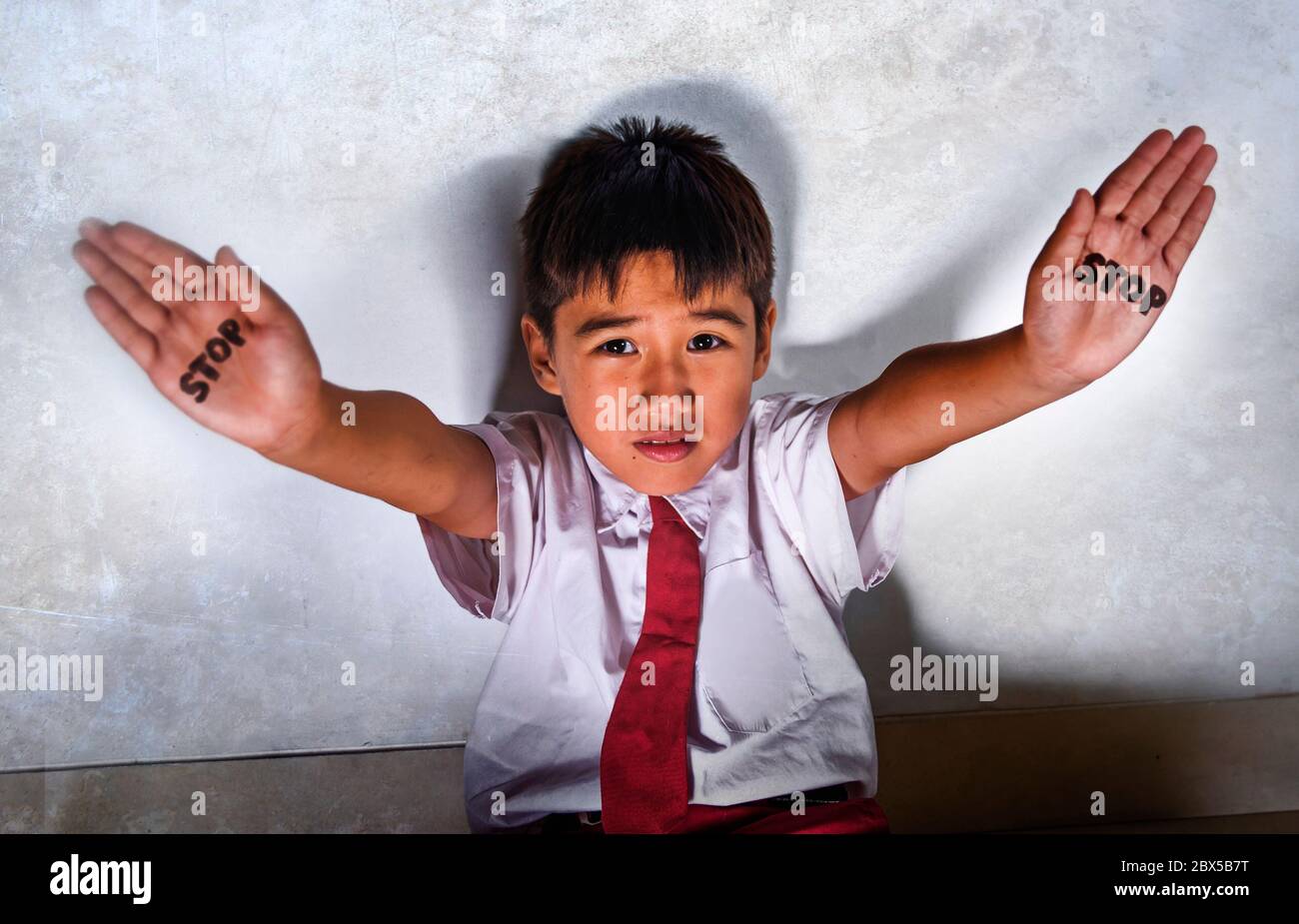 lifestyle dramatic isolated portrait of young kid sad and depressed ...