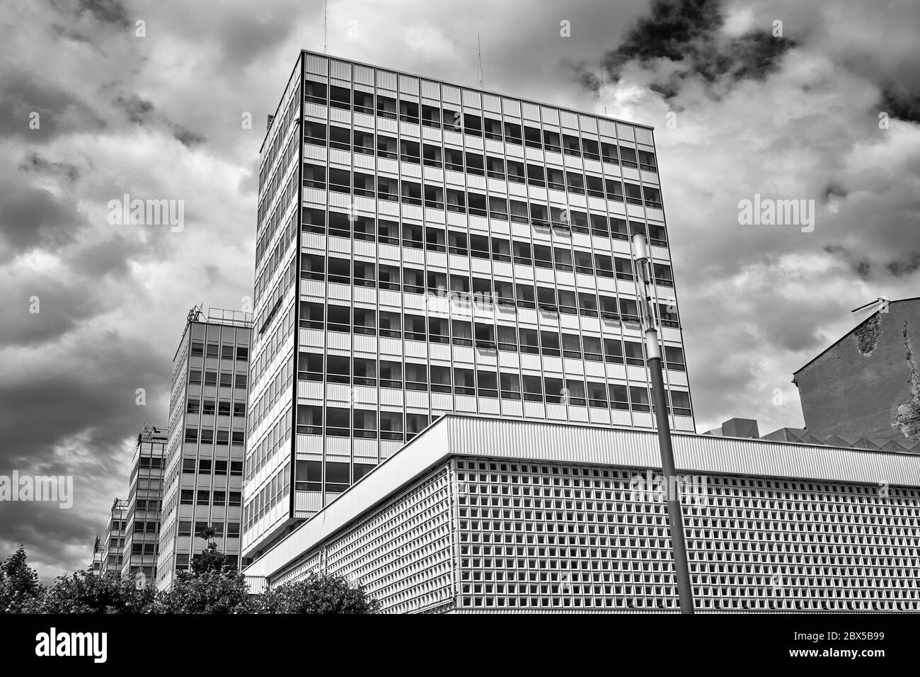 a series of modern high-rise buildings made of glass and aluminum in ...