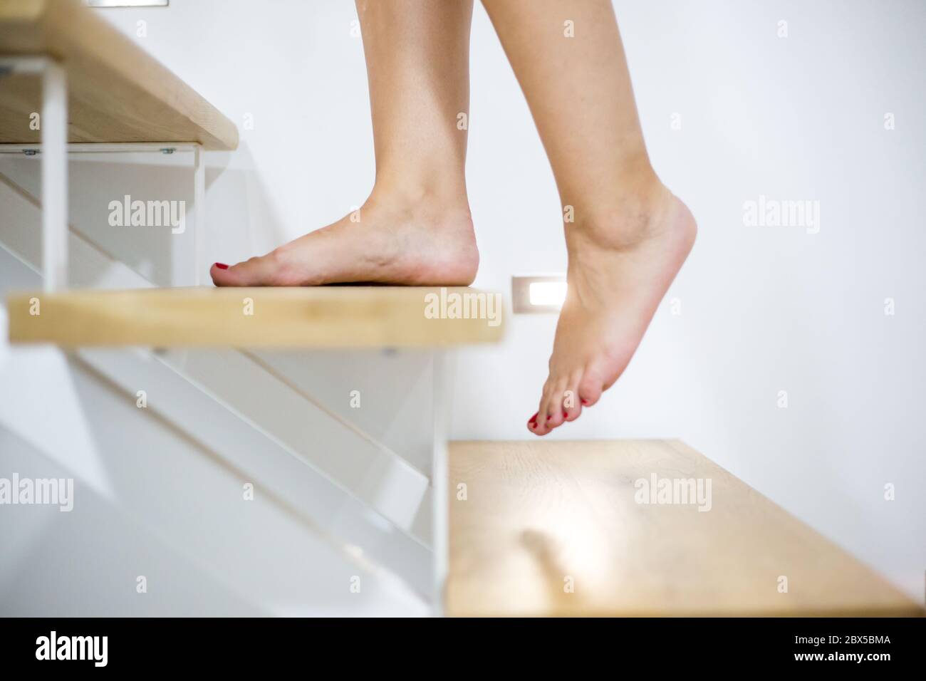Step woman feet stairs hi-res stock photography and images - Alamy
