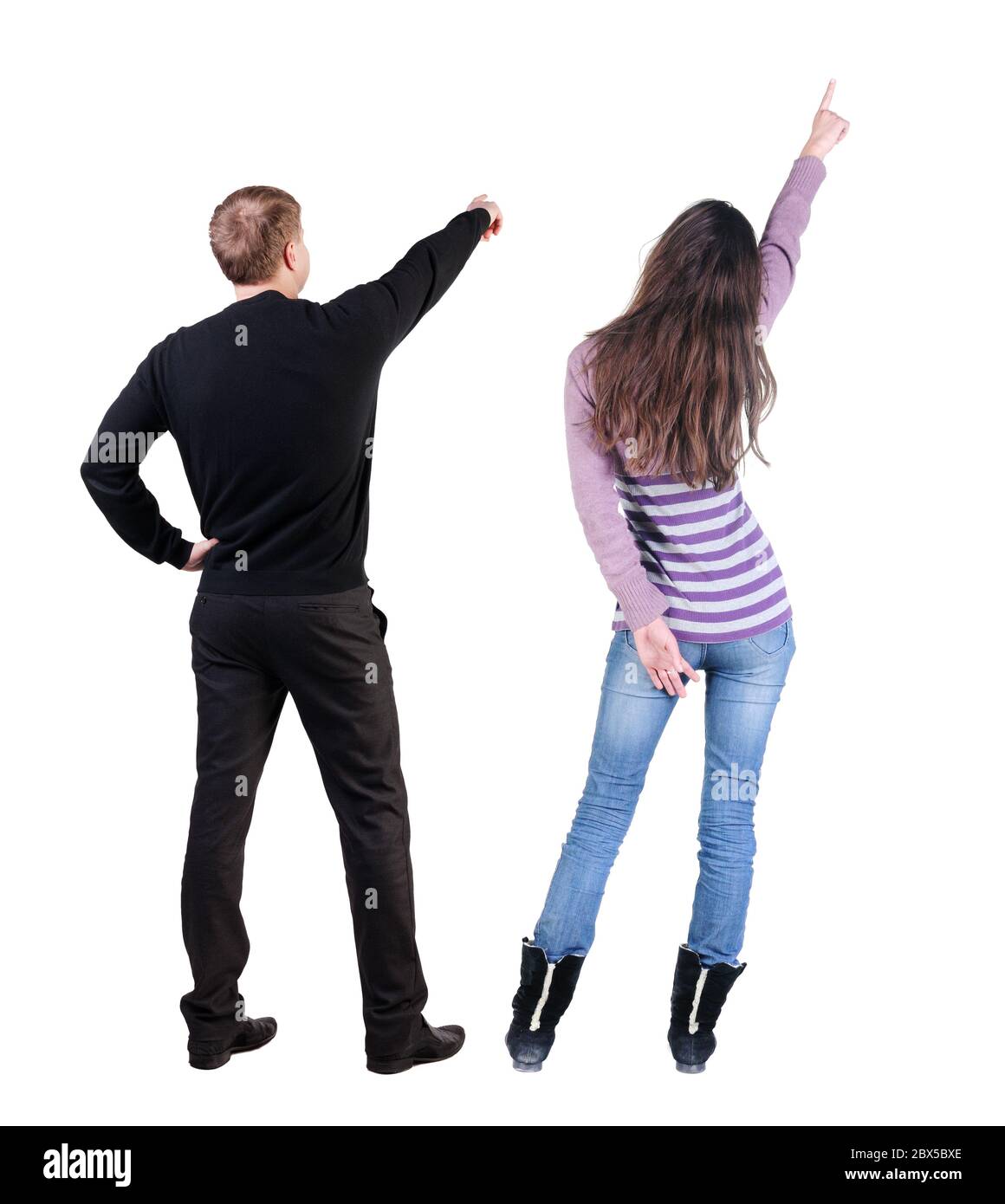 Back view of couple in sweater pointing. Rear view people collection ...