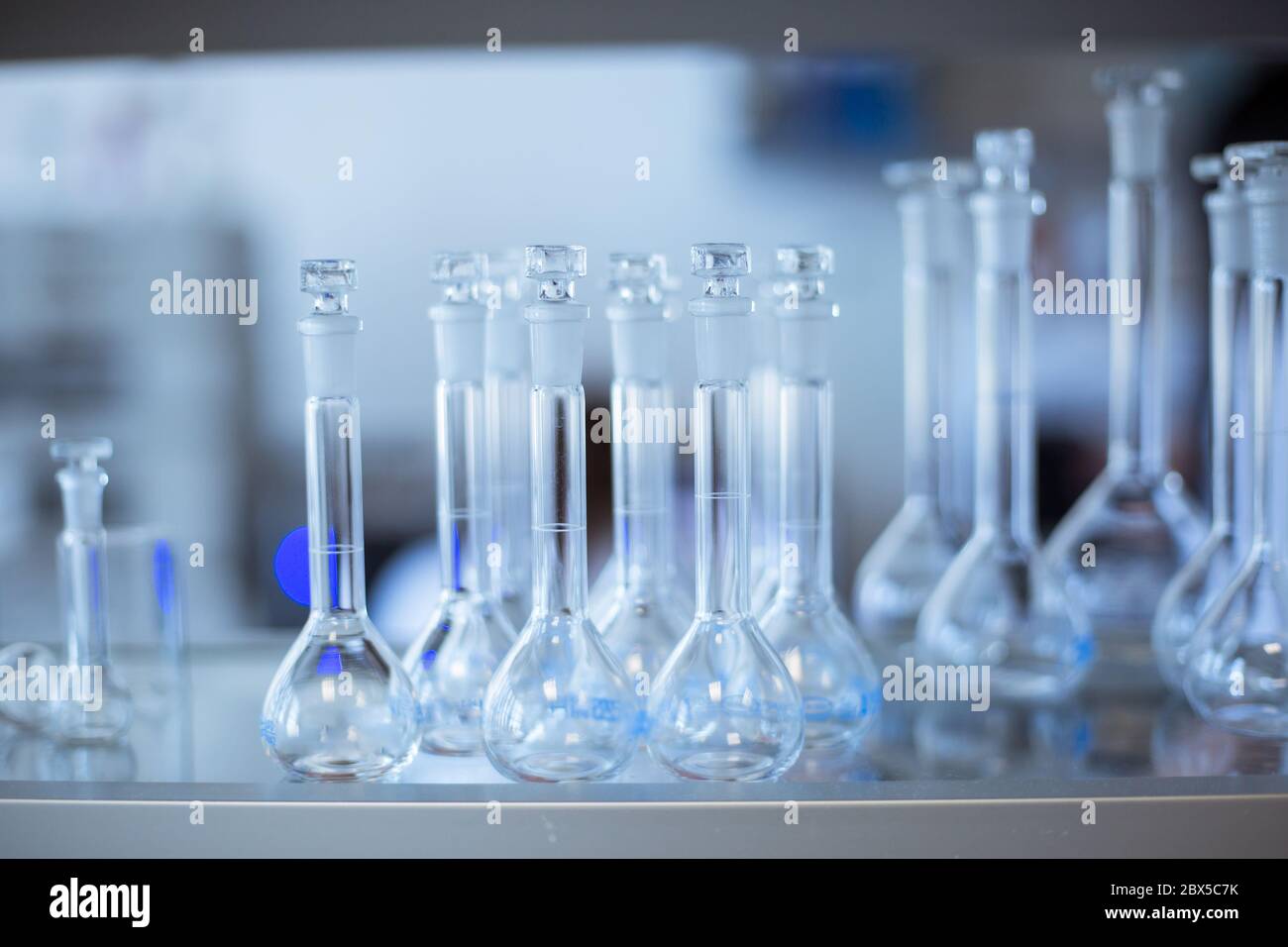 Flasks with liquids in a lab, pharmaceutical industry factory and ...