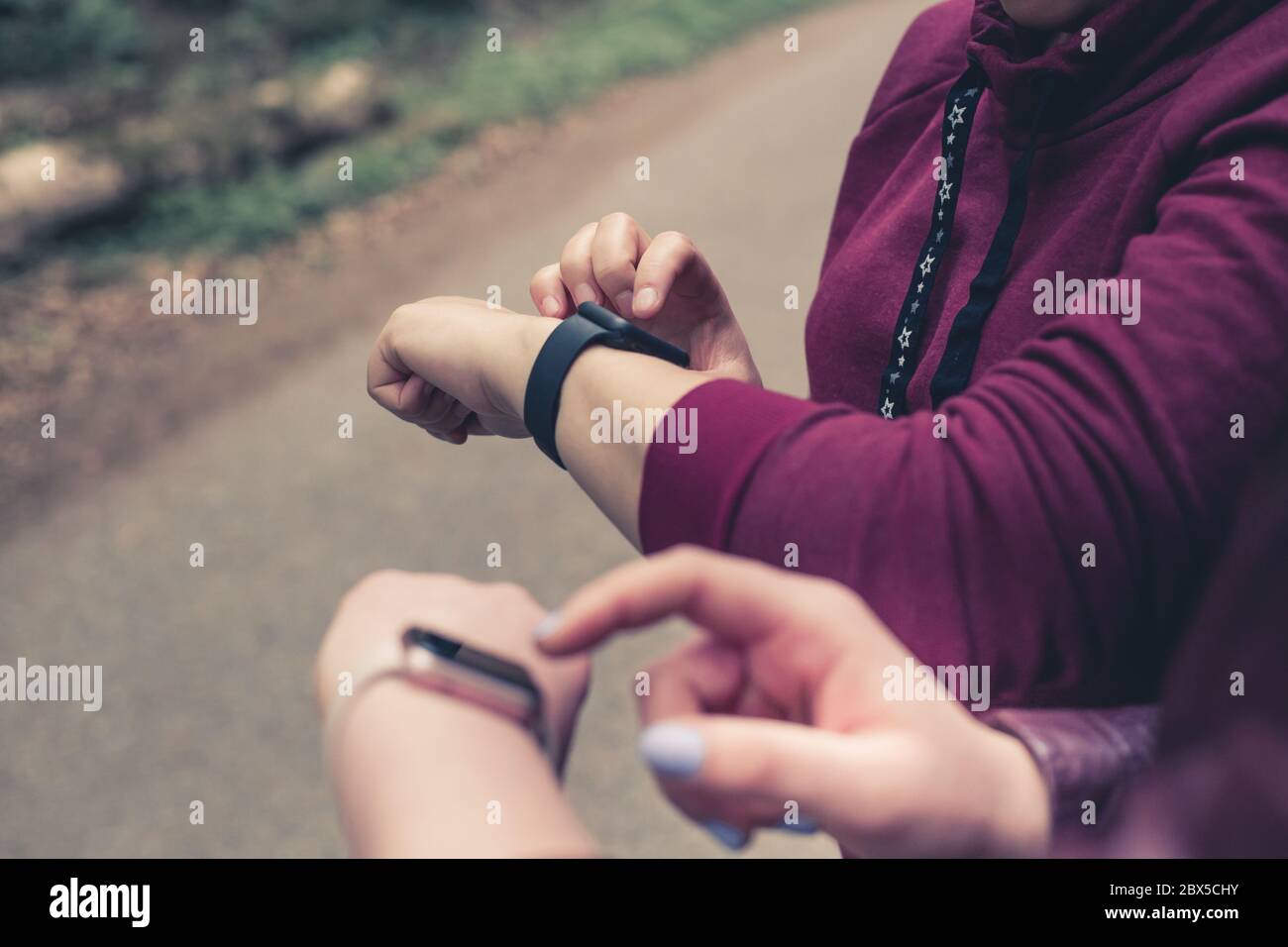 Young girls with smartwatch on the hand, modern technology Stock Photo ...