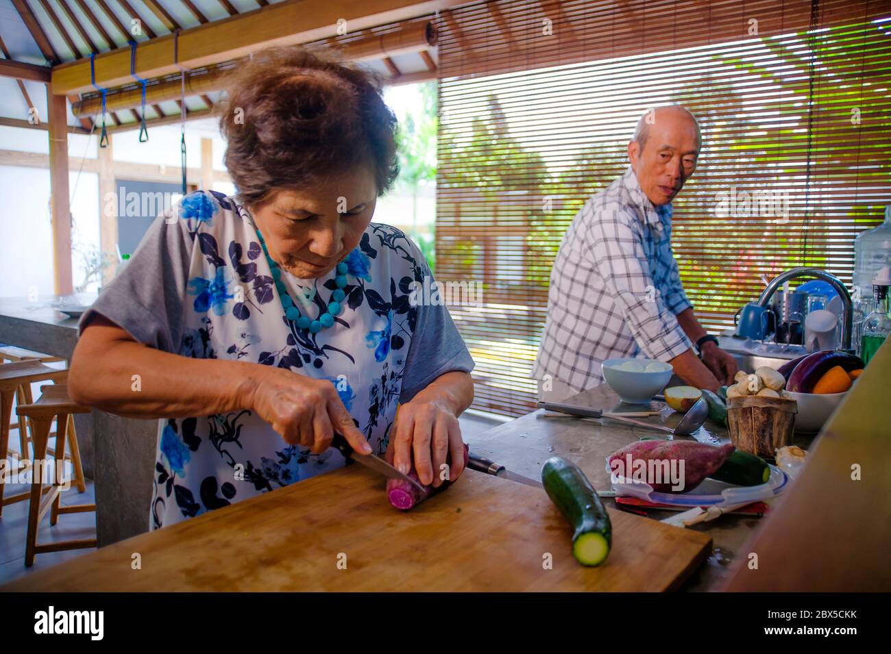 Retired couple enjoying meal at home hi-res stock photography and ...
