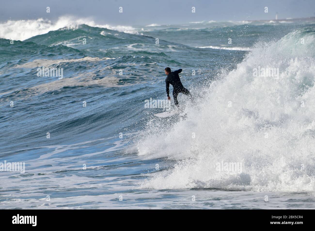 Surfers enjoy big surf conditions at Sydney's Dee Why Beach Stock Photo ...