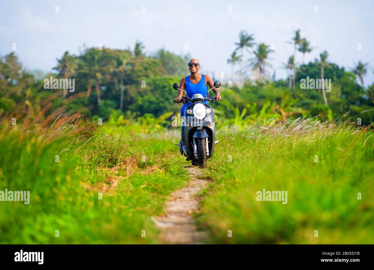 African woman on motorcycle hi-res stock photography and images - Alamy