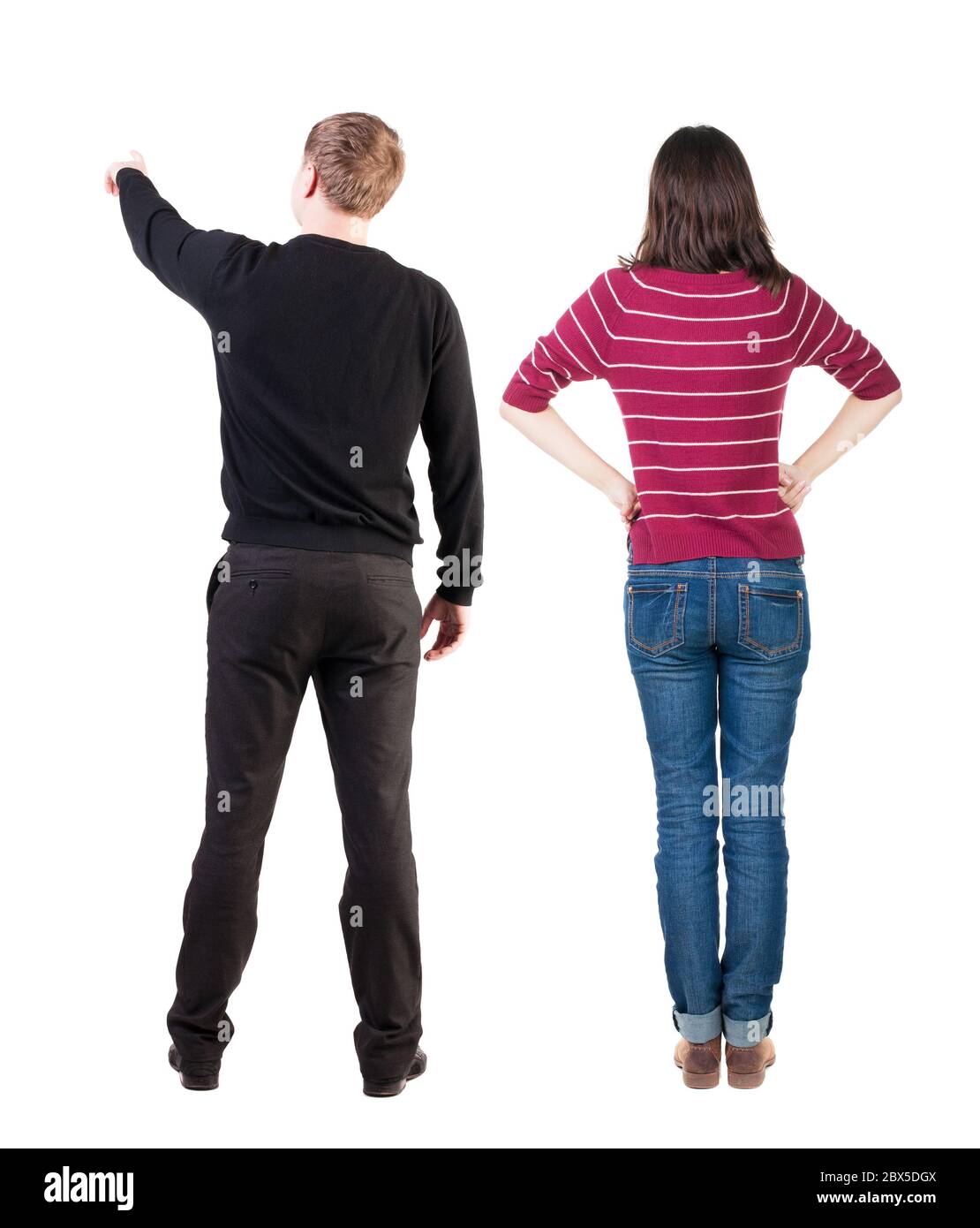 Back view of couple in sweater pointing. Rear view people collection ...