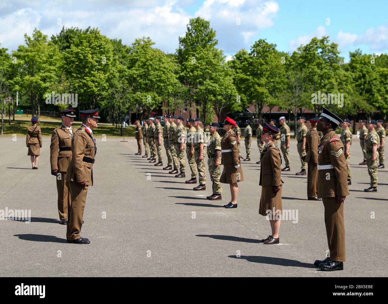 Recruits are inspected during a passing out parade at Sir John Moore ...
