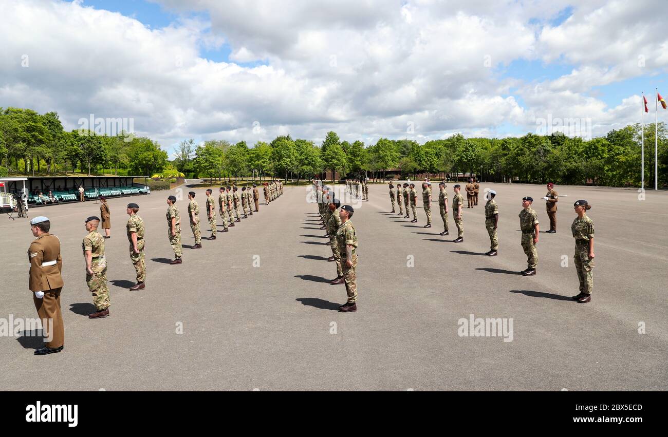 Recruits are inspected during a passing out parade at Sir John Moore ...