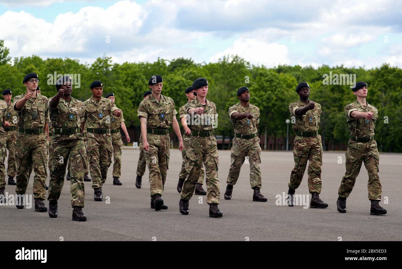 Recruits march during a passing out parade at Sir John Moore Barracks ...
