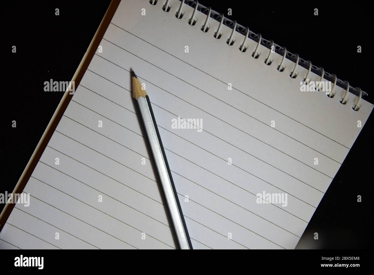 Pad and pencil Stock Photo - Alamy