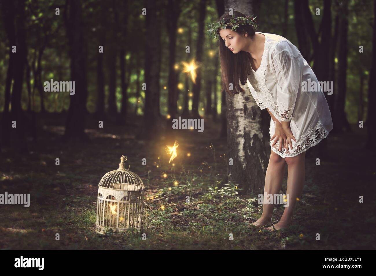 Beautiful young woman with her fairy friends . Fantasy concept Stock ...