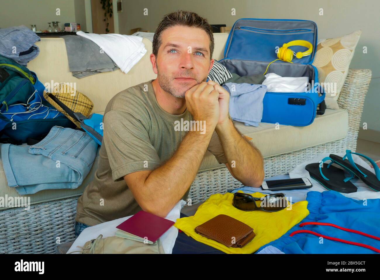 Suitcase packing mess hi-res stock photography and images - Alamy