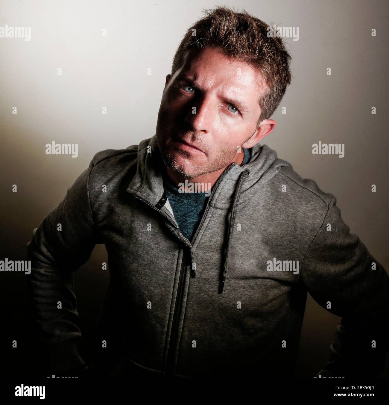 young attractive angry and upset man looking with intense and ...