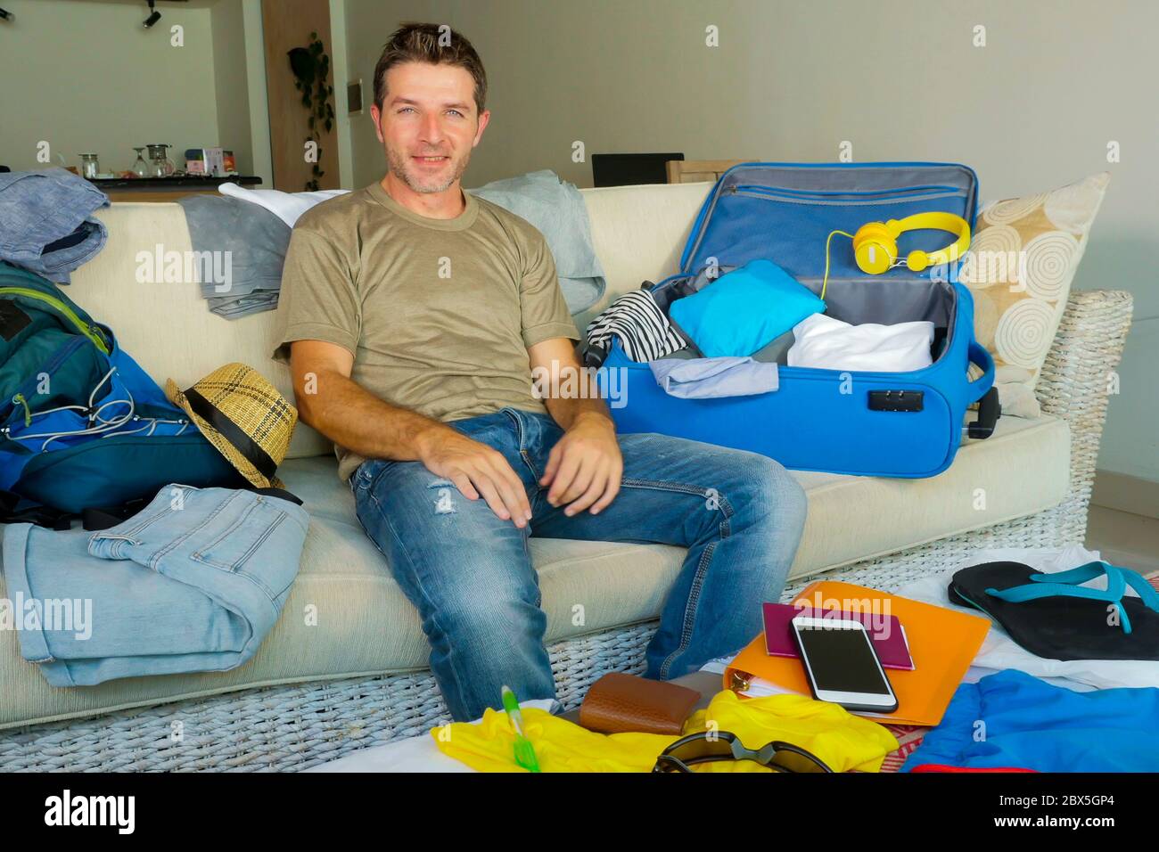 Suitcase packing mess hi-res stock photography and images - Alamy