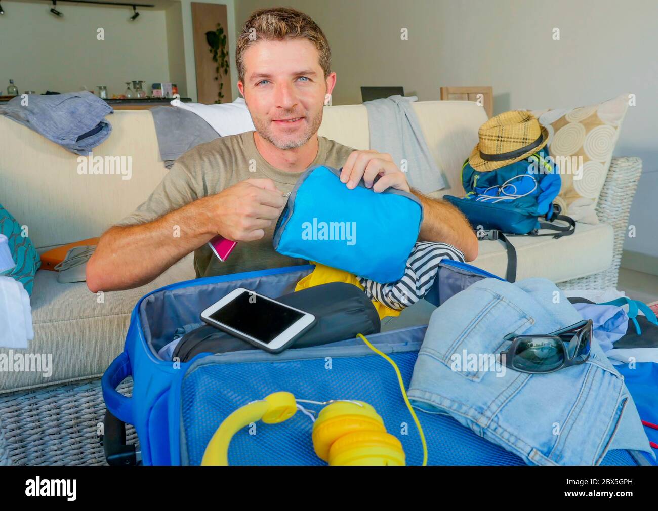 Suitcase packing mess hi-res stock photography and images - Alamy