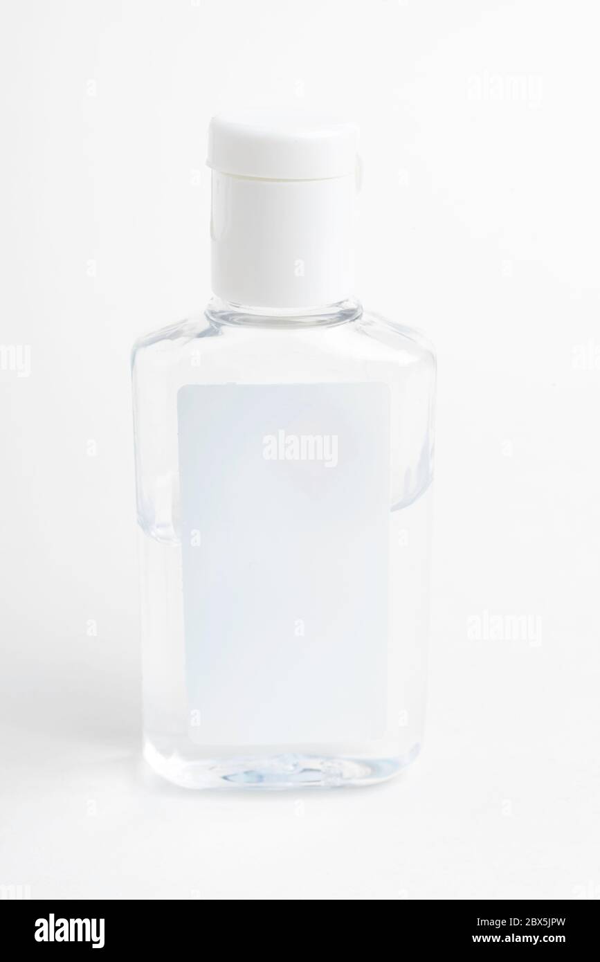 A product shot of a generic pocket-size transparent hand sanitizer ...