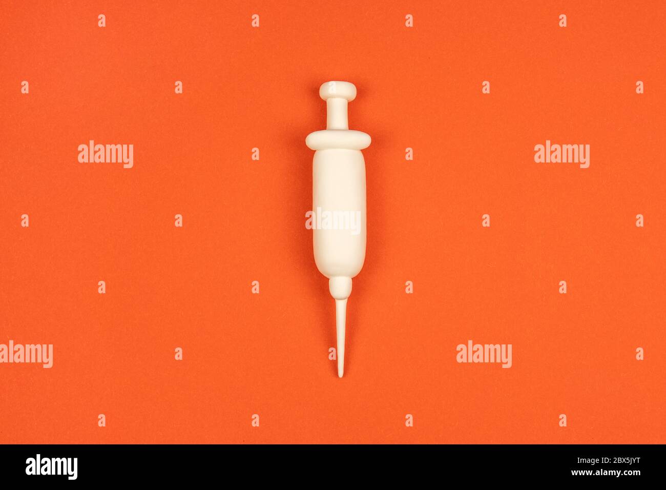 Syringe, 3d mock-up element on red background. Vaccination concept ...