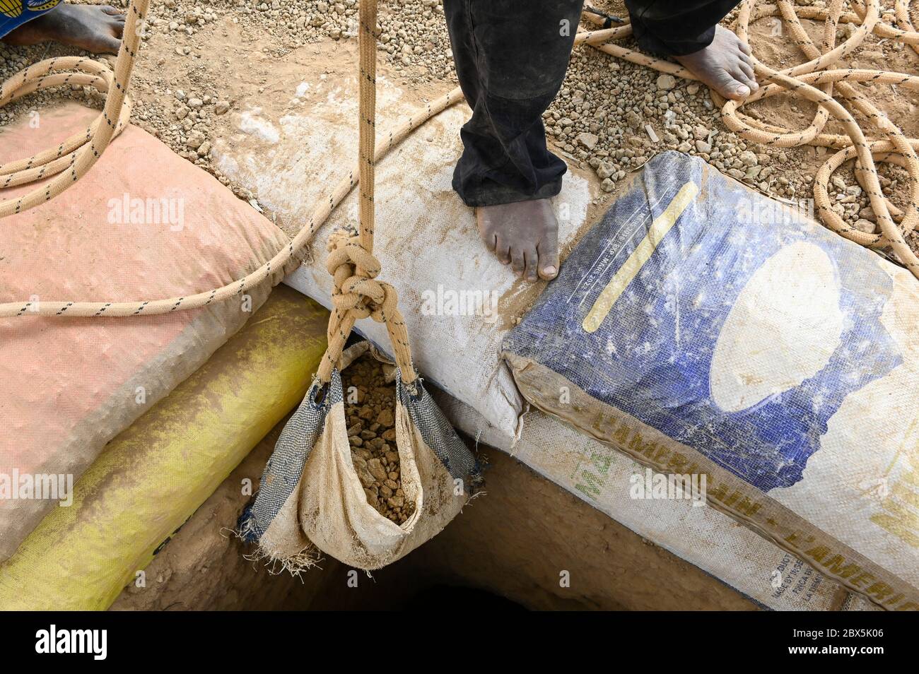 MALI, Kayes, Sadiola, artisanal gold mining at Camp SIRIMANA, winch to ...
