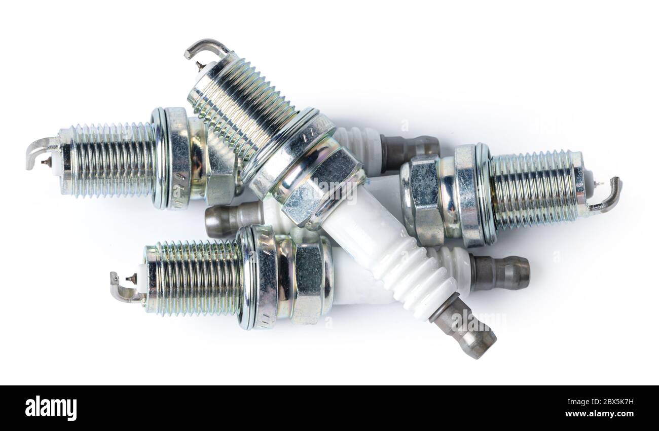 Car part. Spark plugs isolated on white Stock Photo - Alamy