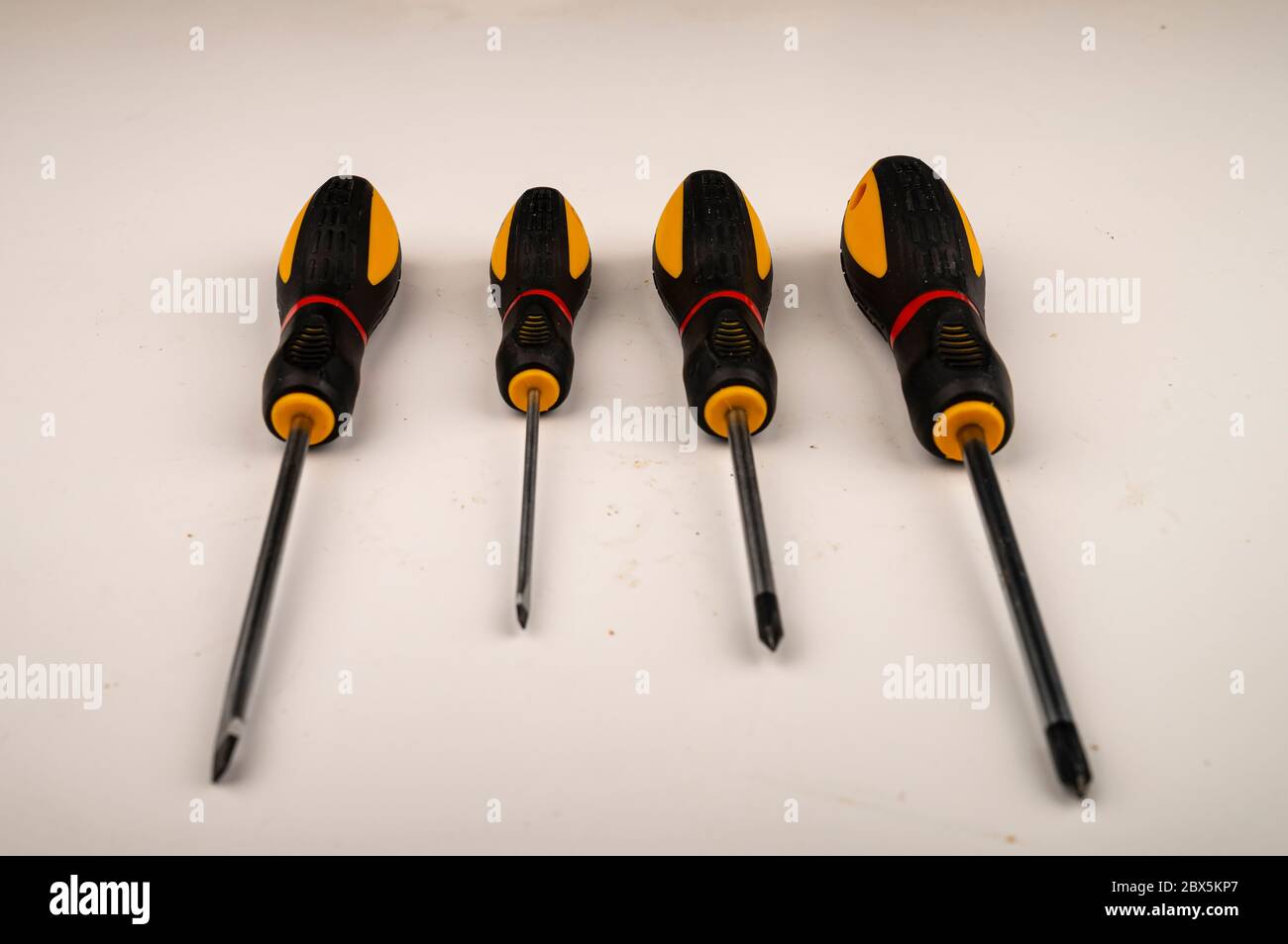 Different screwdrivers on a white background. Close up. Manual ...