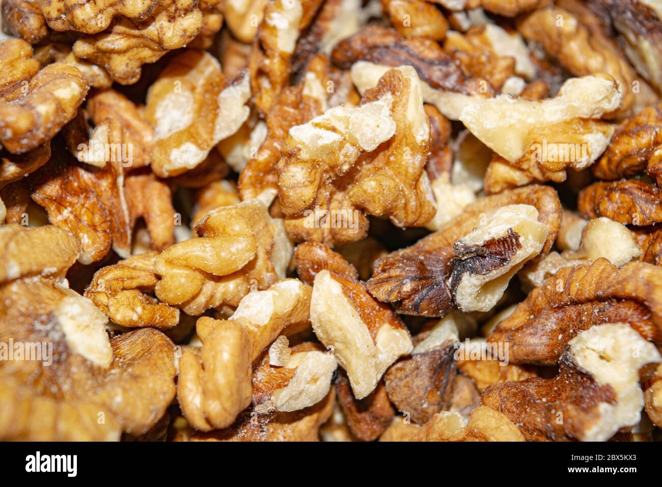 Peeled walnuts close-up. Surface texture. Healthy diet Stock Photo - Alamy