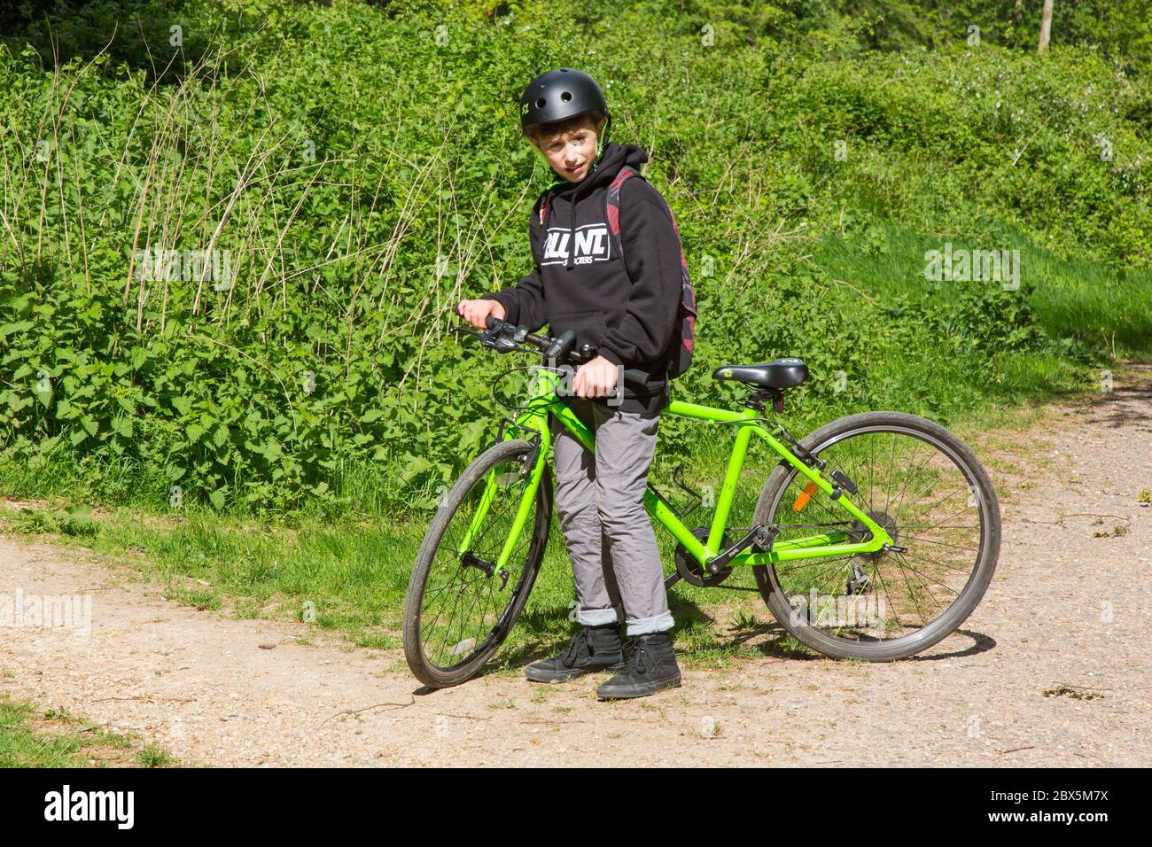 Boy on bike hi-res stock photography and images - Alamy