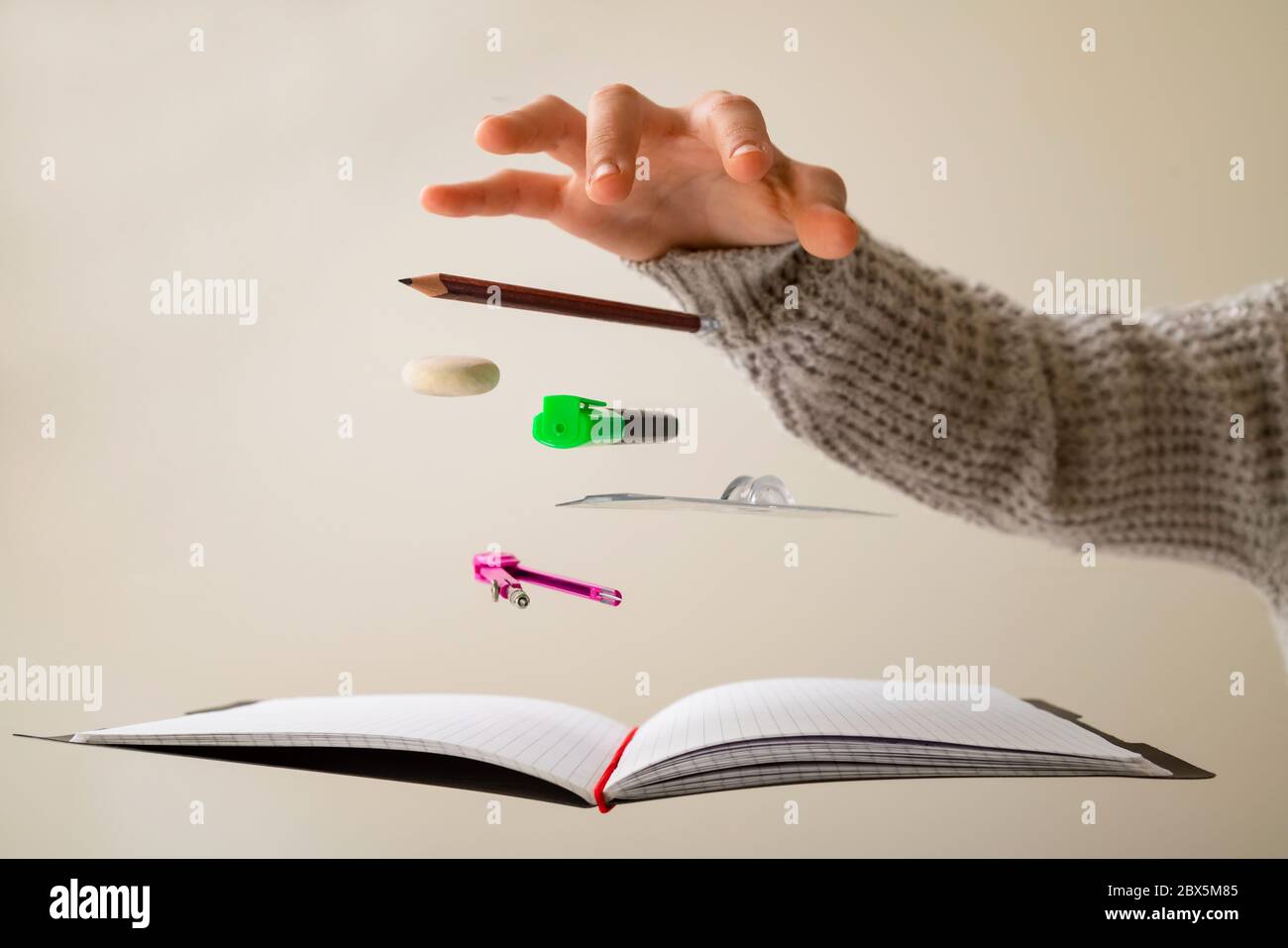 Levitating school supplies for math - notebook, pen, ruler, pencil ...
