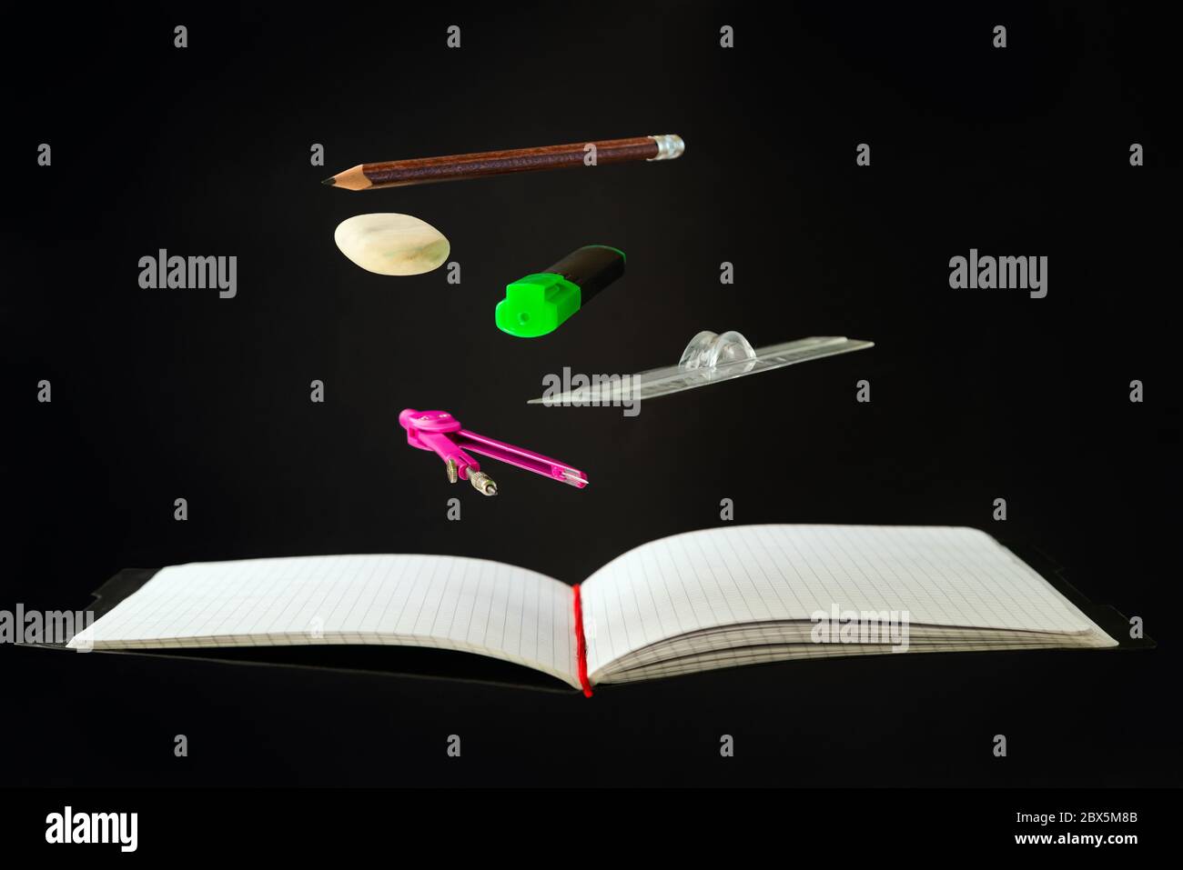 Levitating school supplies for math - notebook, pen, ruler, pencil ...