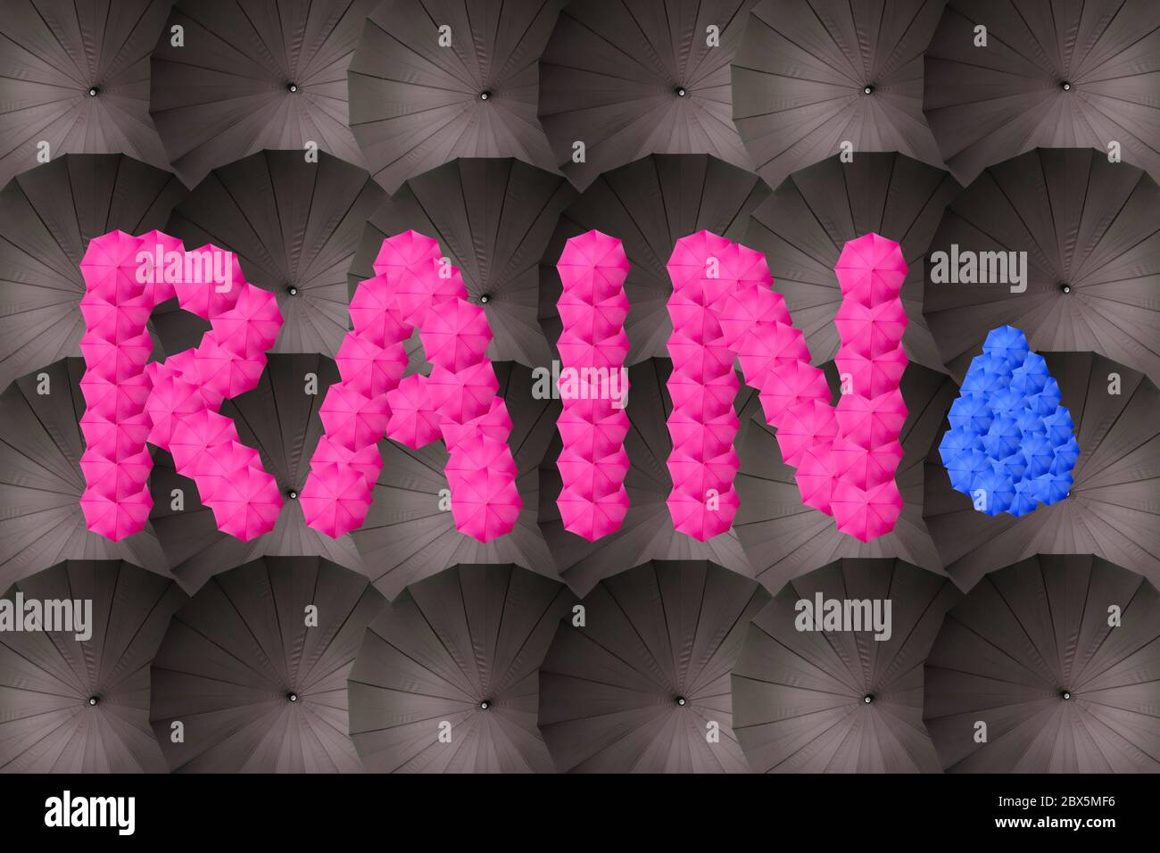 Rain concept. Rain letters arranged of umbrella on dark background. Bad ...