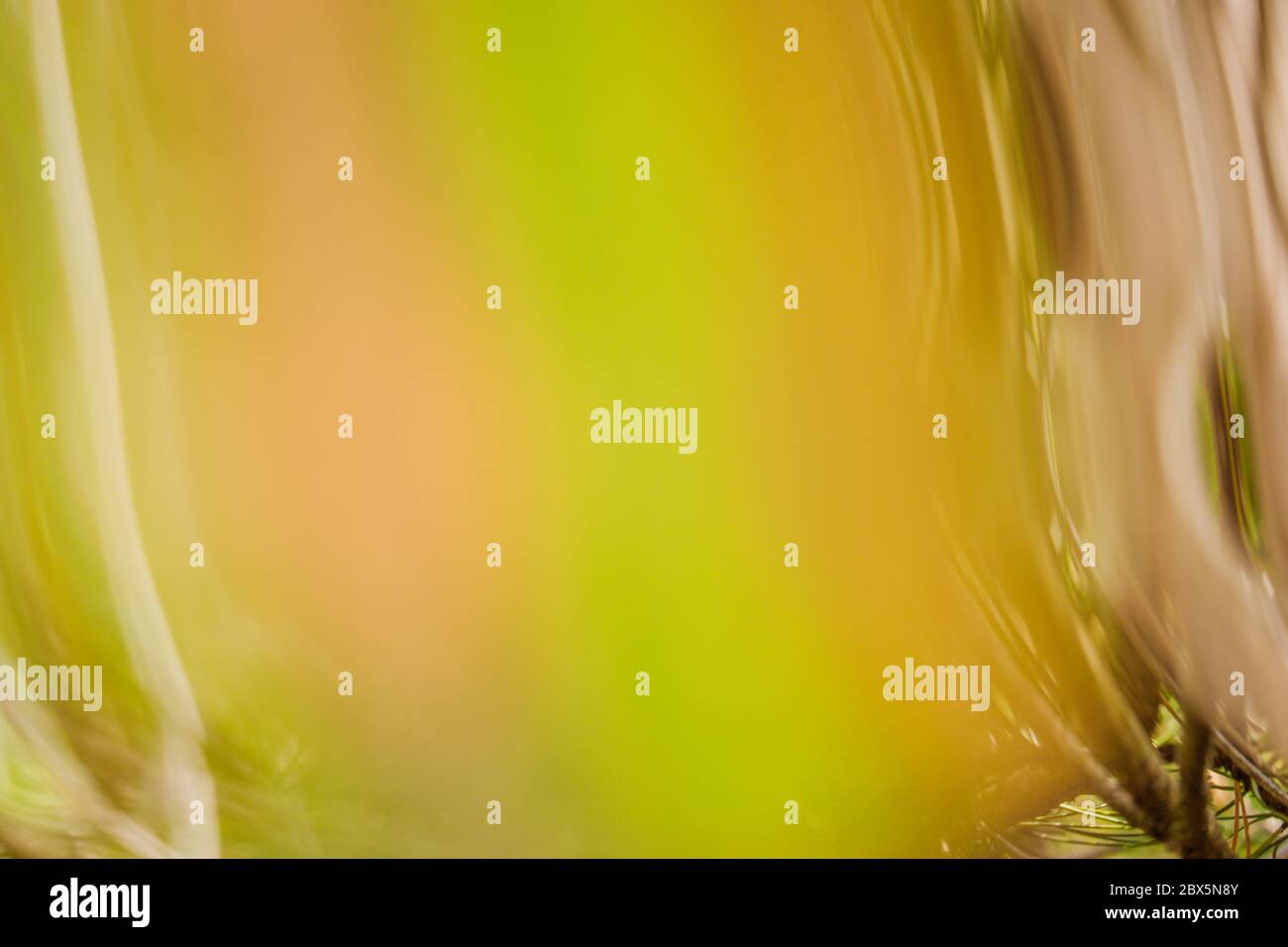 golden green wavey abstract background showing movement Stock Photo - Alamy