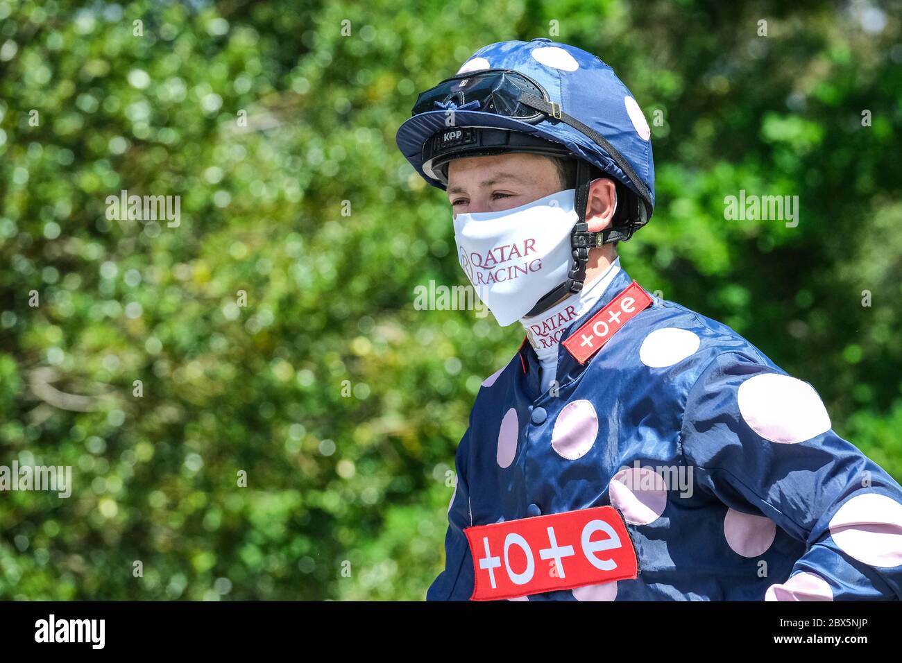 Jockey Oisin Murphy wearing a Qatar Racing Mask at Lingfield Racecourse ...