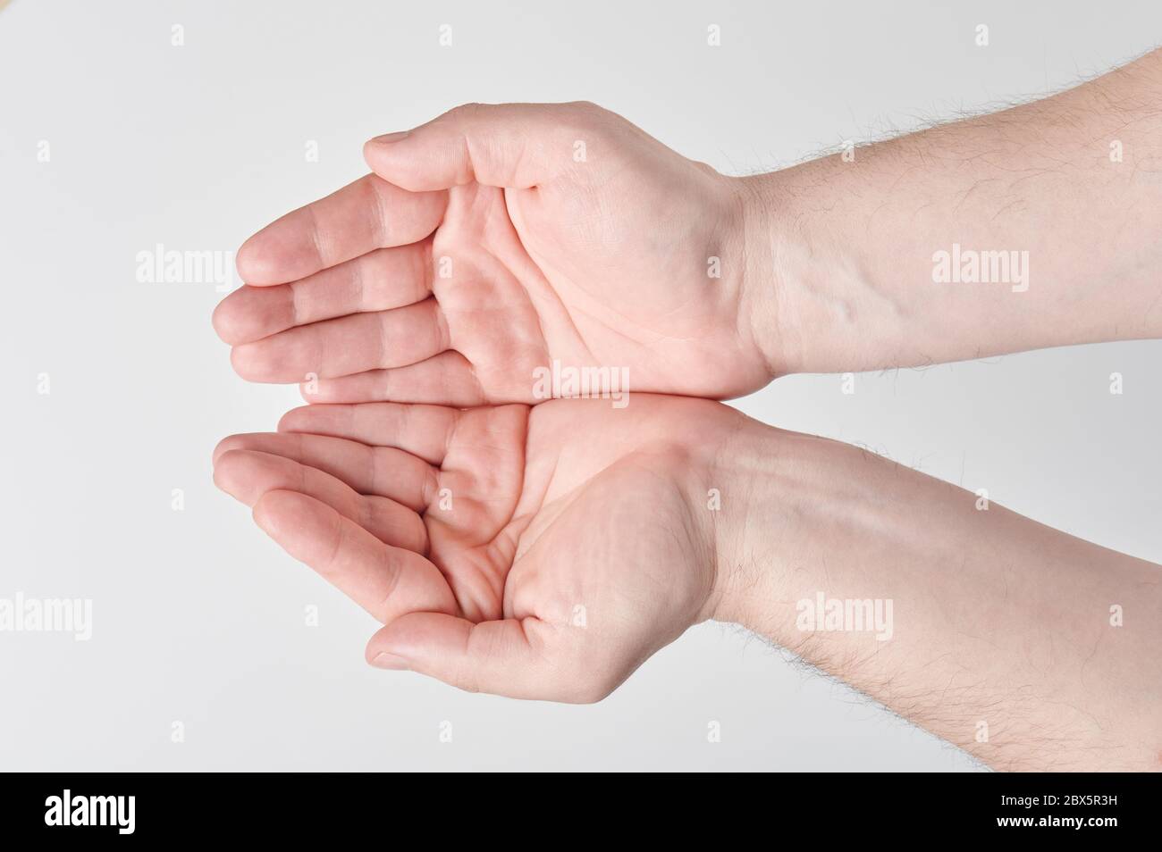 Open hand palms with give space isolated on white background Stock ...