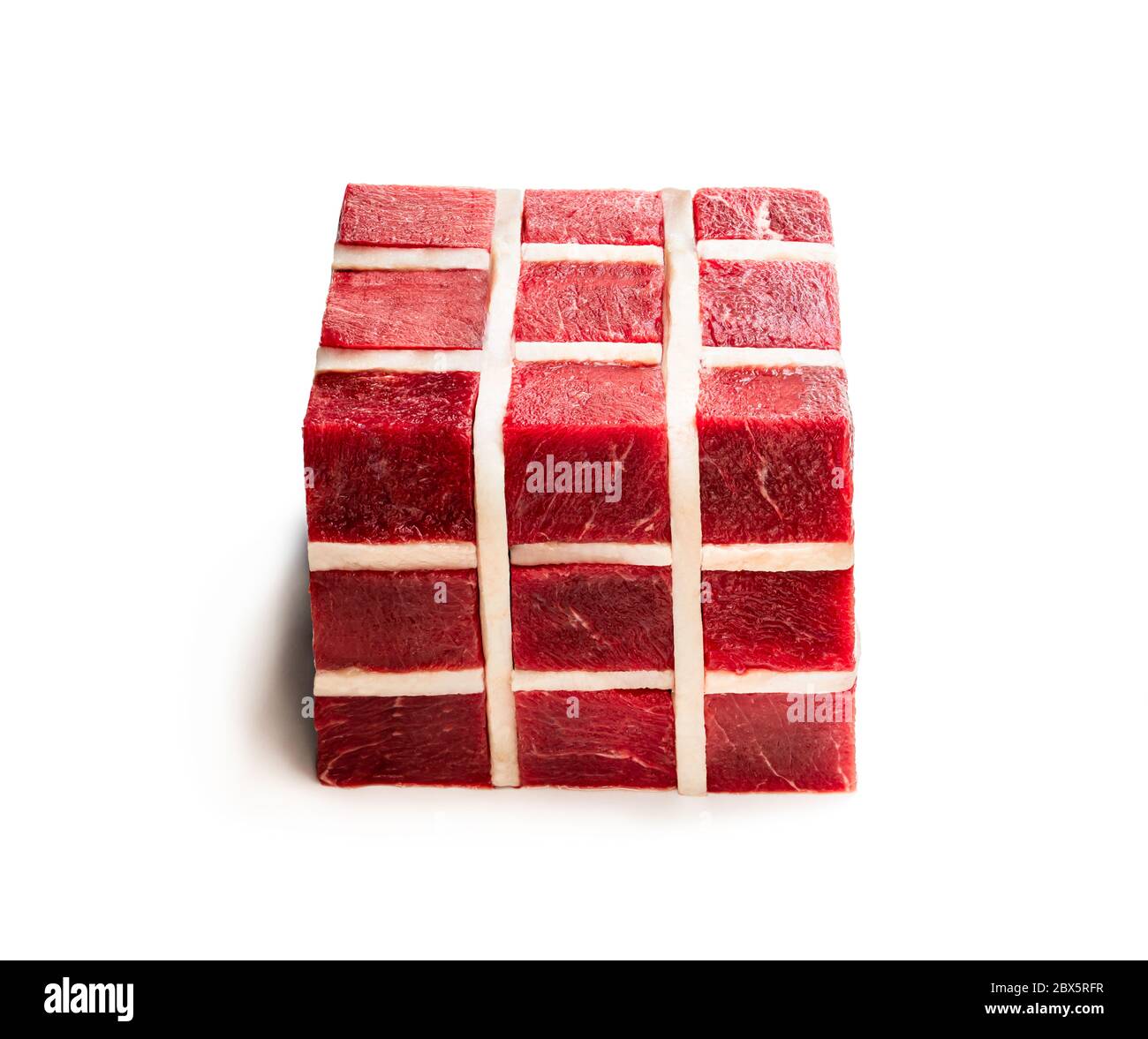 Puzzle cube made of fresh meat and lard isolated on white concept Stock ...