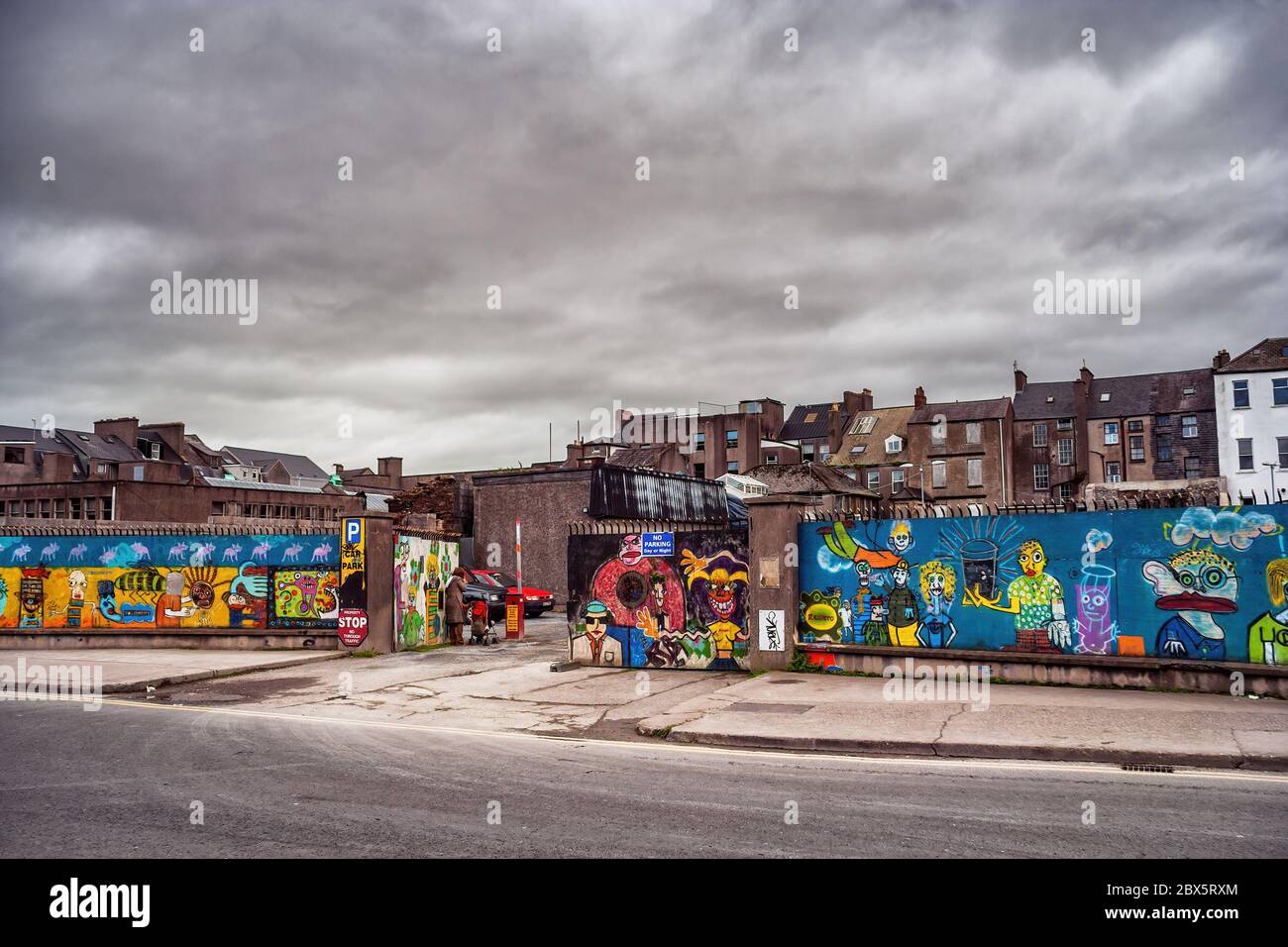 Wall covered with murals, street art in city of Cork in Ireland Stock ...