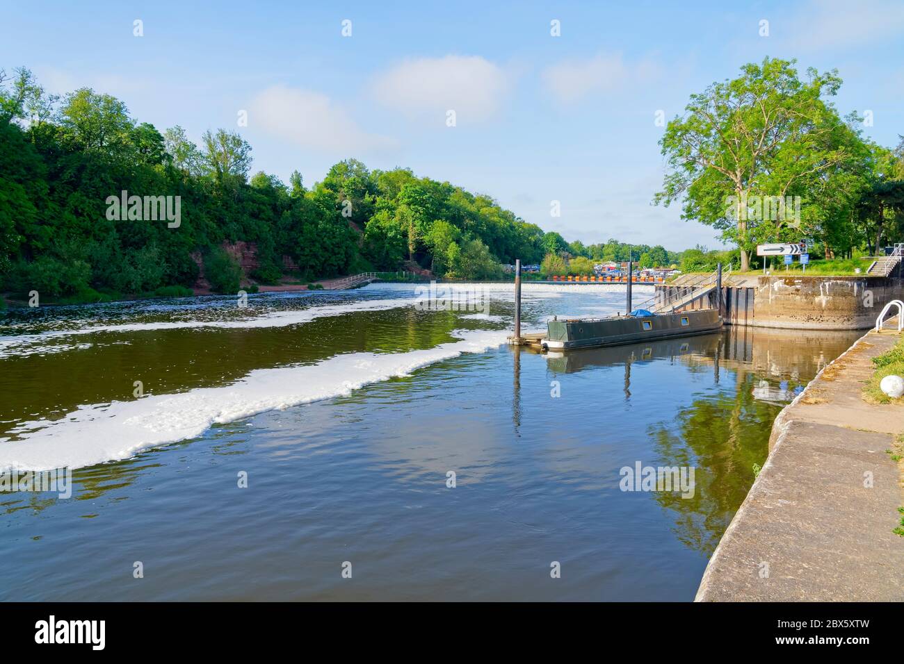 Old barge moored near Gunthorpe locks below the weir on the River Trent ...