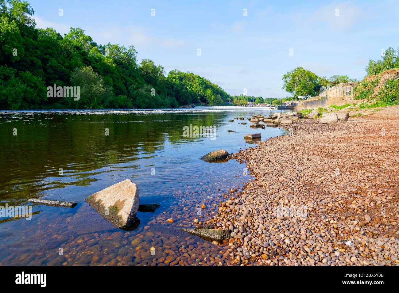 On the rocky shore of the River Trent, close to the water, near ...