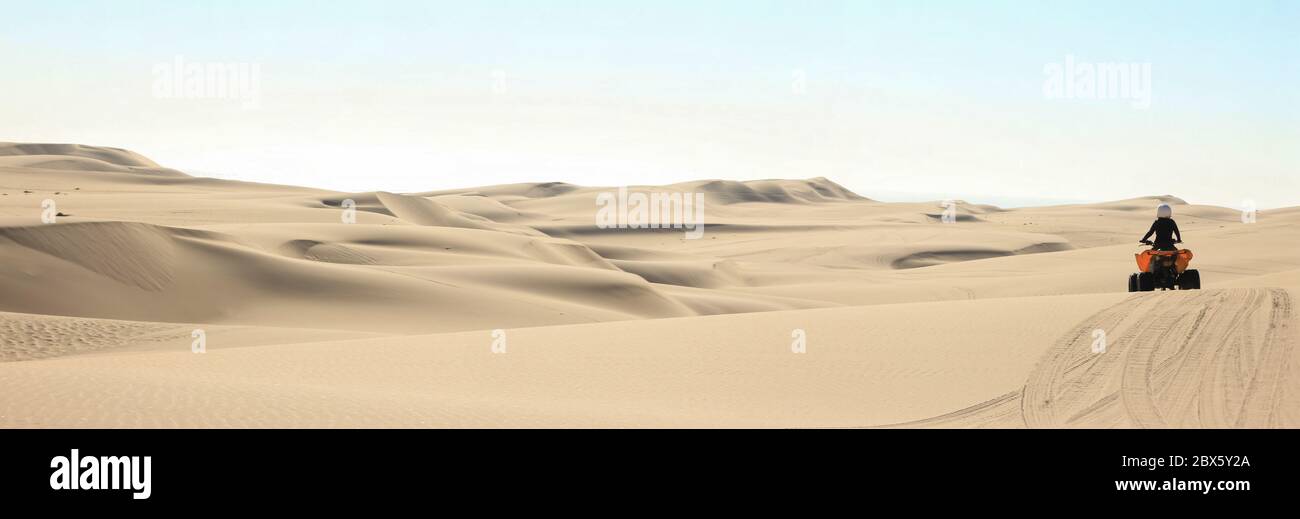 Quad driving people - one happy biker in sand desert dunes, Africa ...