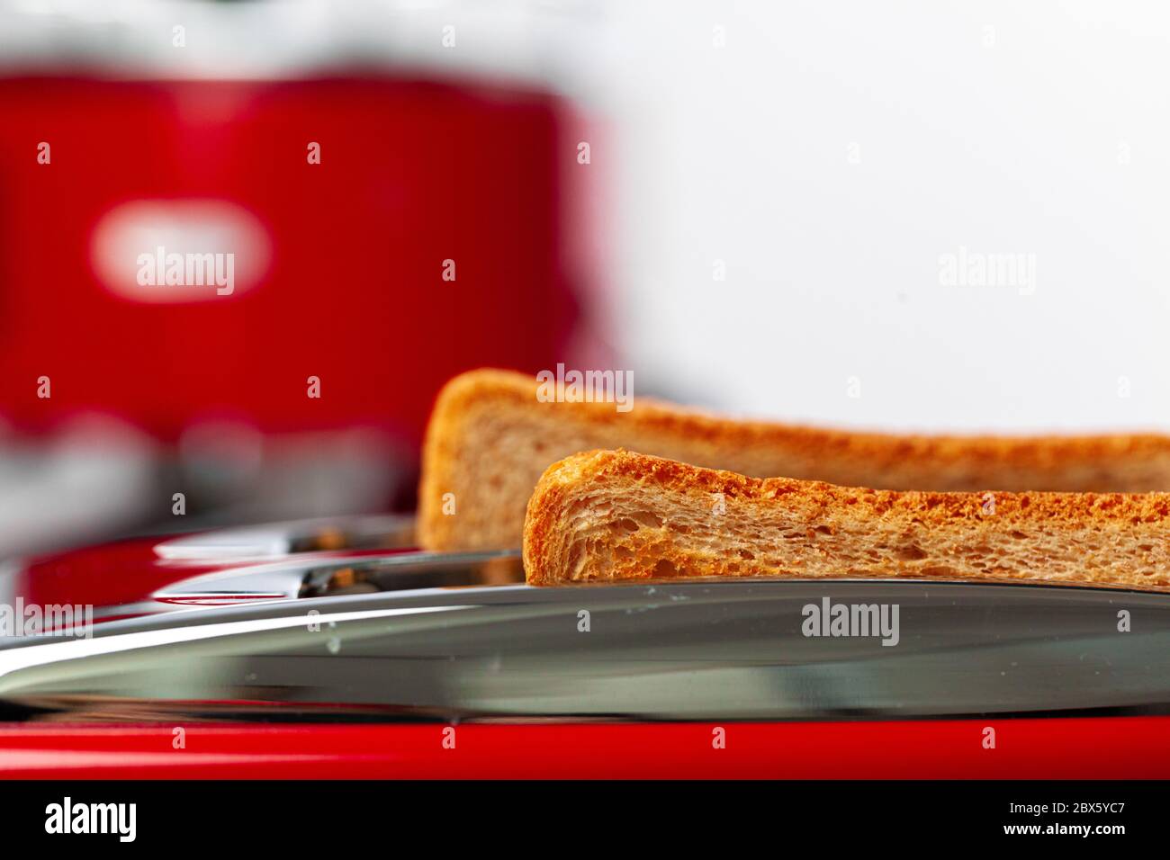 Couple of prepared toasts in a toaster Stock Photo - Alamy