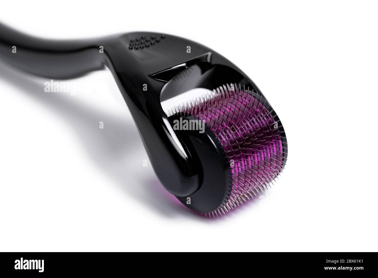 Derma roller isolated on a white background. The device for cosmetic ...