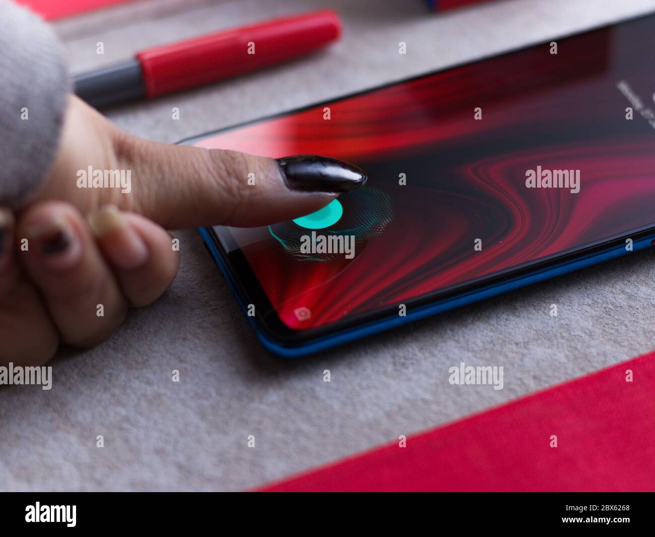 In-display fingerprint sensor of new phone stock image Stock Photo - Alamy