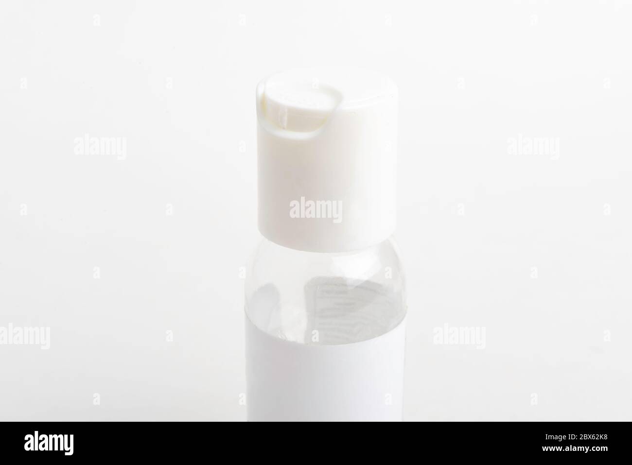 A close-up product shot of the top white cap of a pocket-size ...