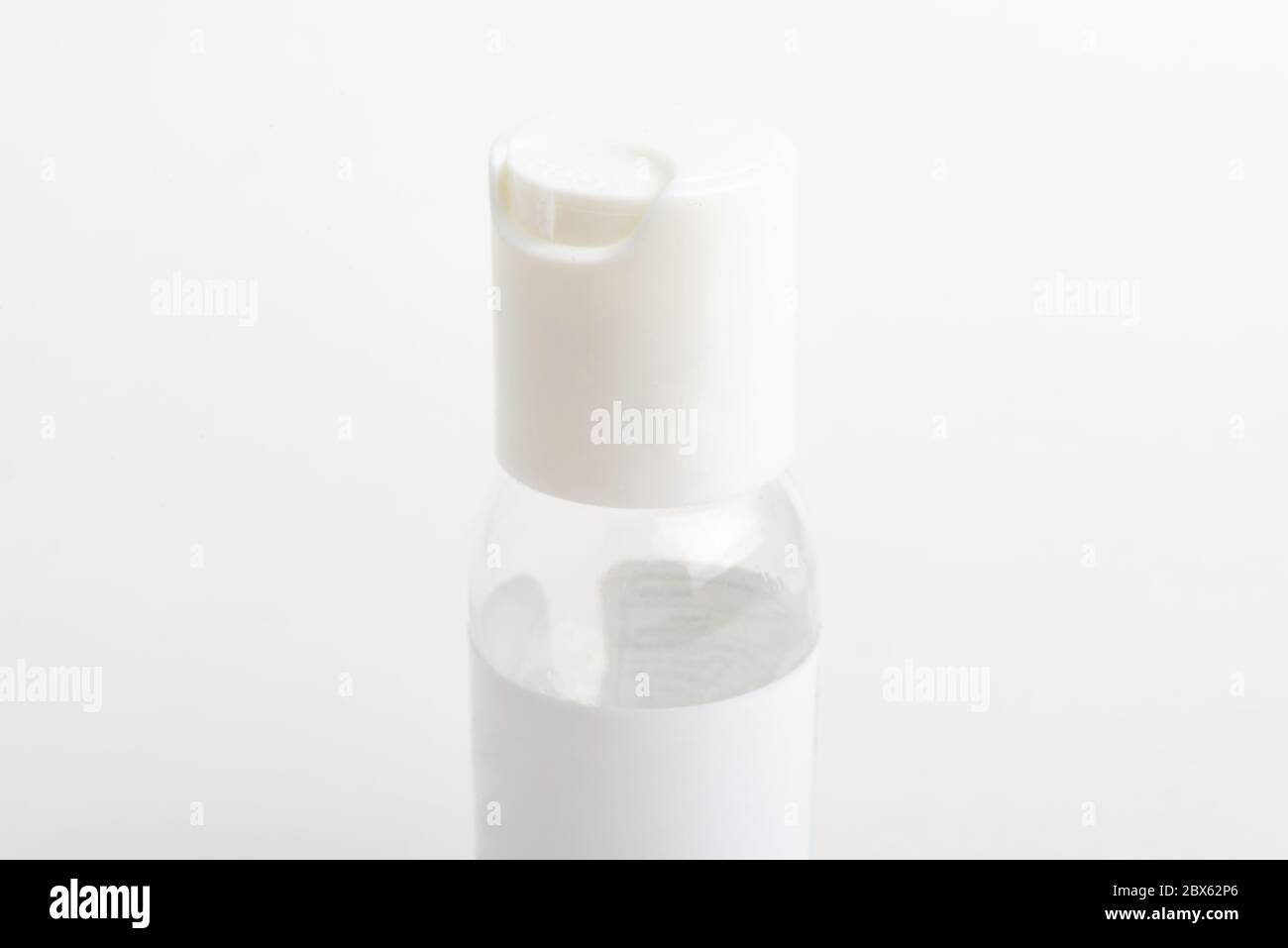 A close-up product shot of the top white cap of a pocket-size ...
