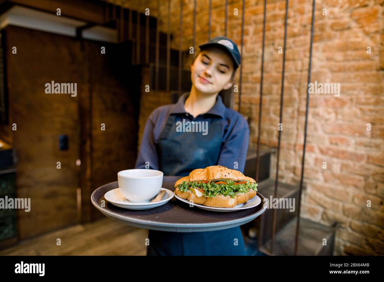 Helpful shop assistant hi-res stock photography and images - Alamy
