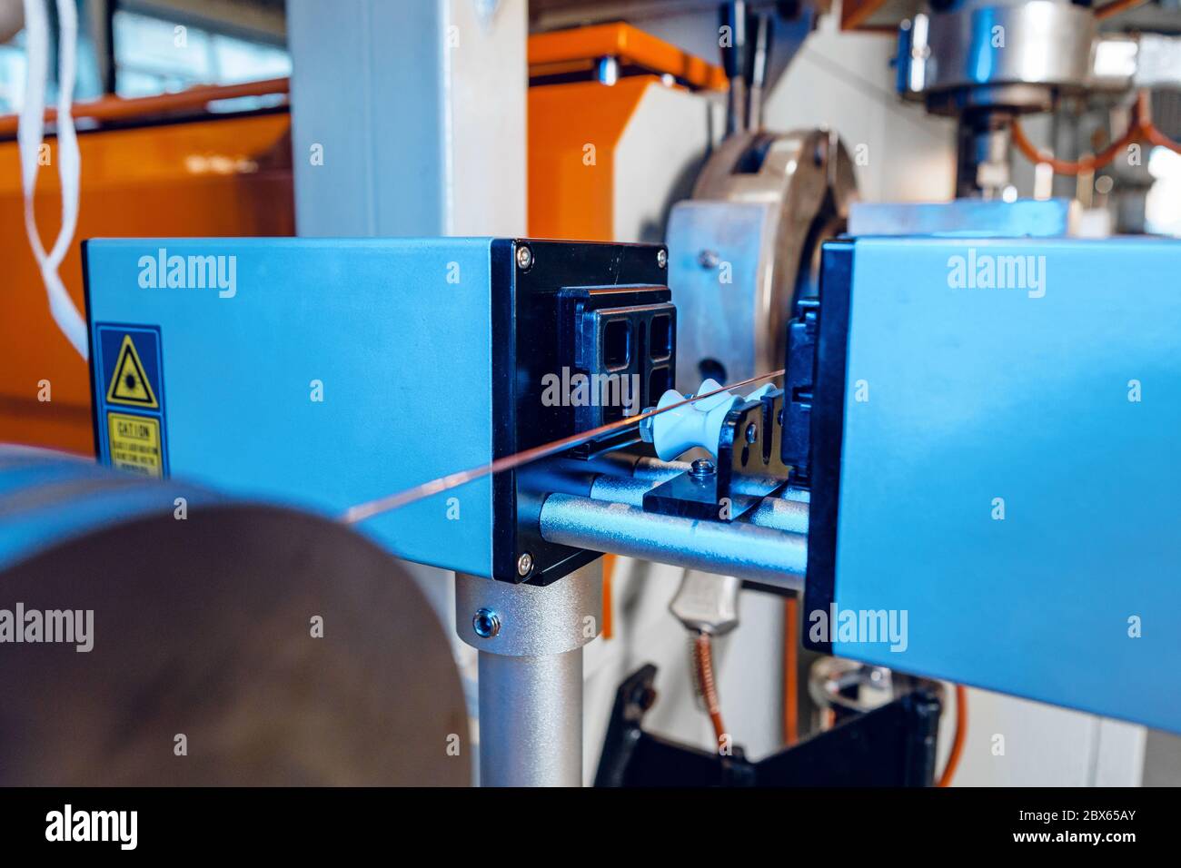 Inside a modern plant producing power electric cables and optical ...