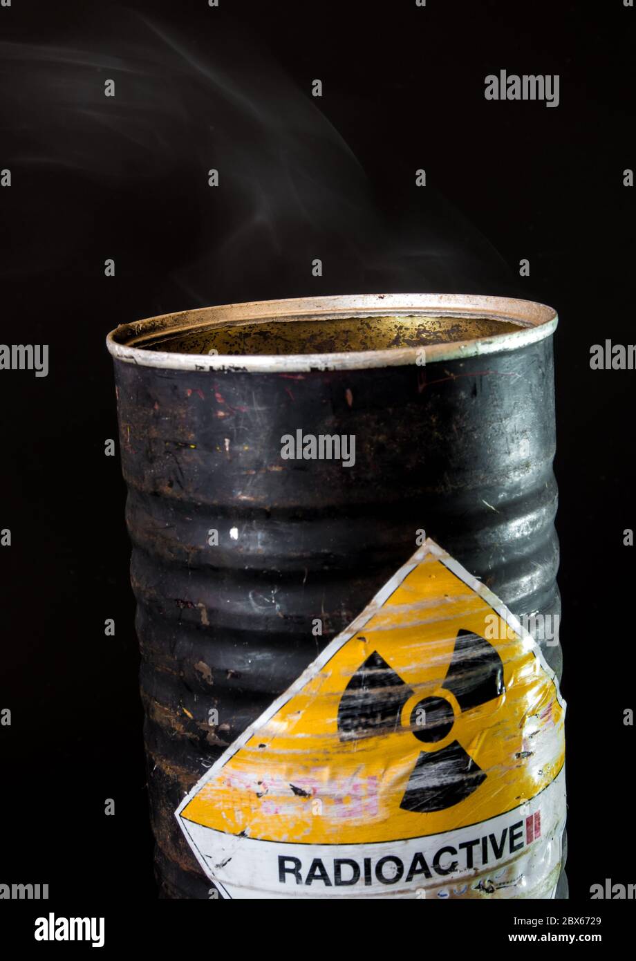 Smoke in the old cylinder container of radioactive material Stock Photo ...
