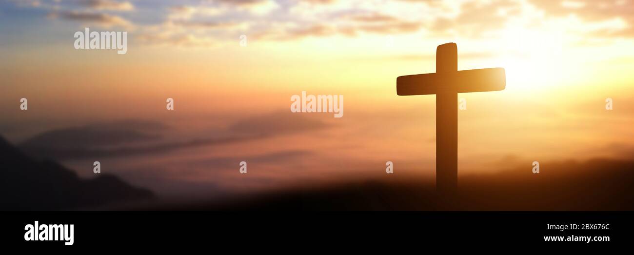 Silhouette of catholic cross at sunset background. panorama picture ...