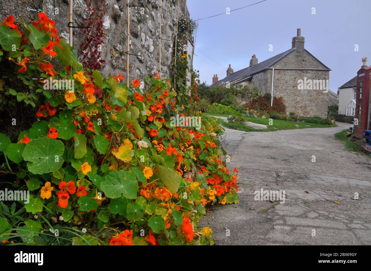 The main street through Higher Town on St Martins one of the five ...