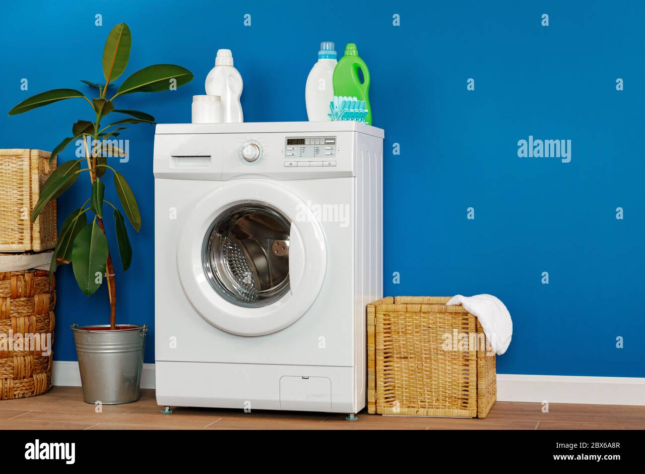 Laundry room. Close up of washing machine Stock Photo - Alamy