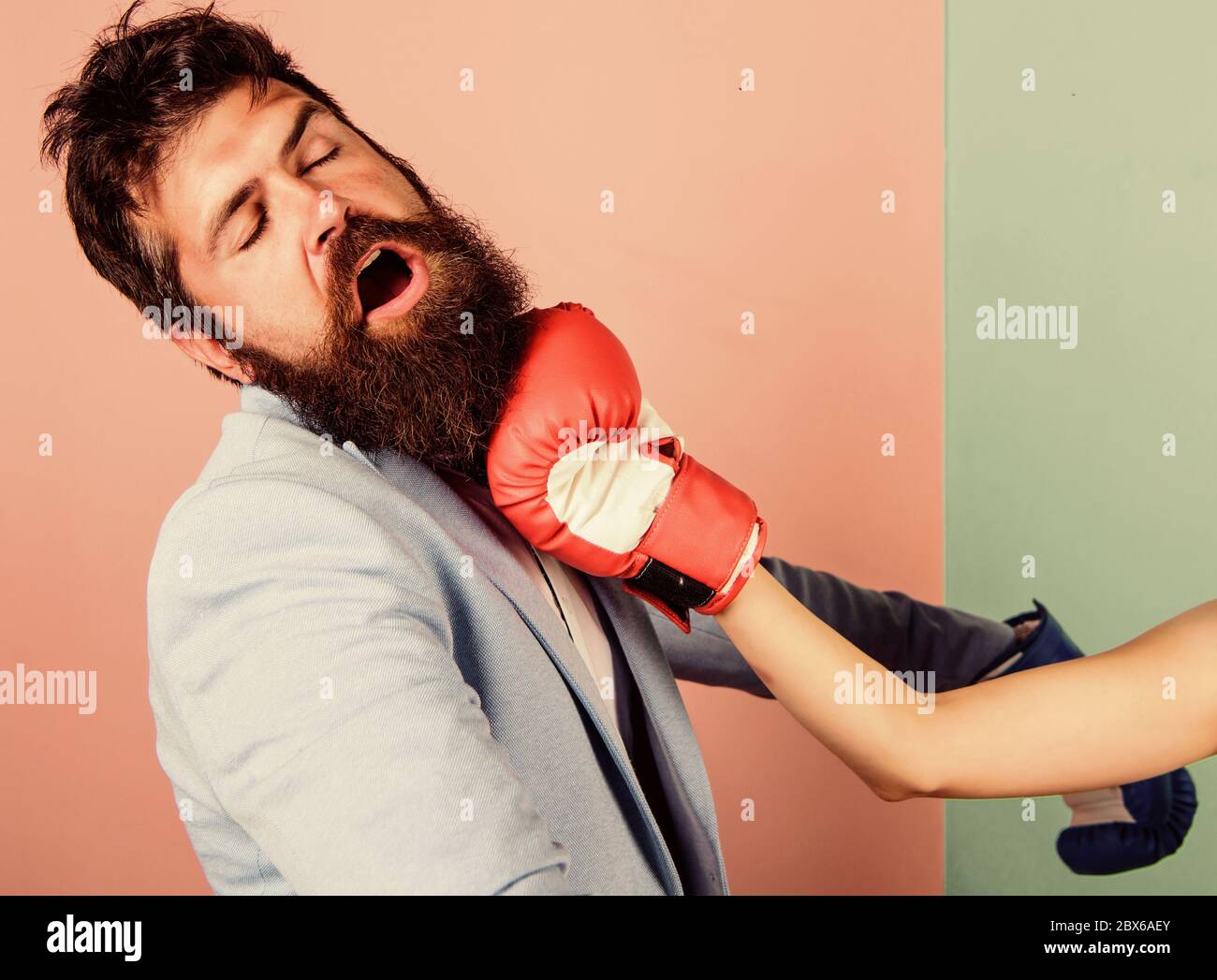 bearded man hipster defeated by woman. businessman failed. knockout ...
