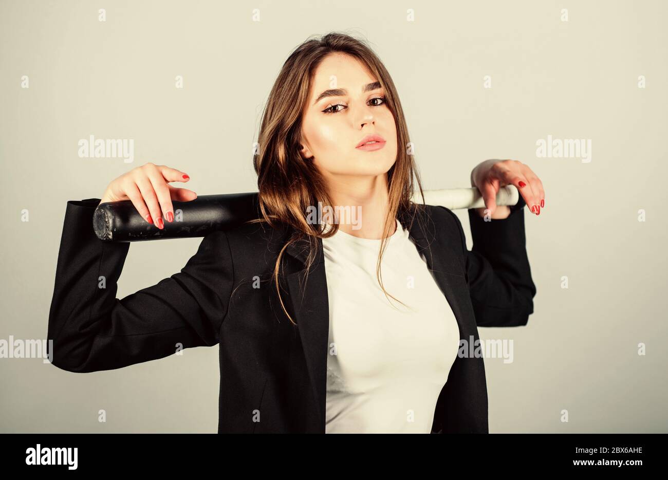 Confidence and strength. Woman pretty girl bear formal jacket and hold ...